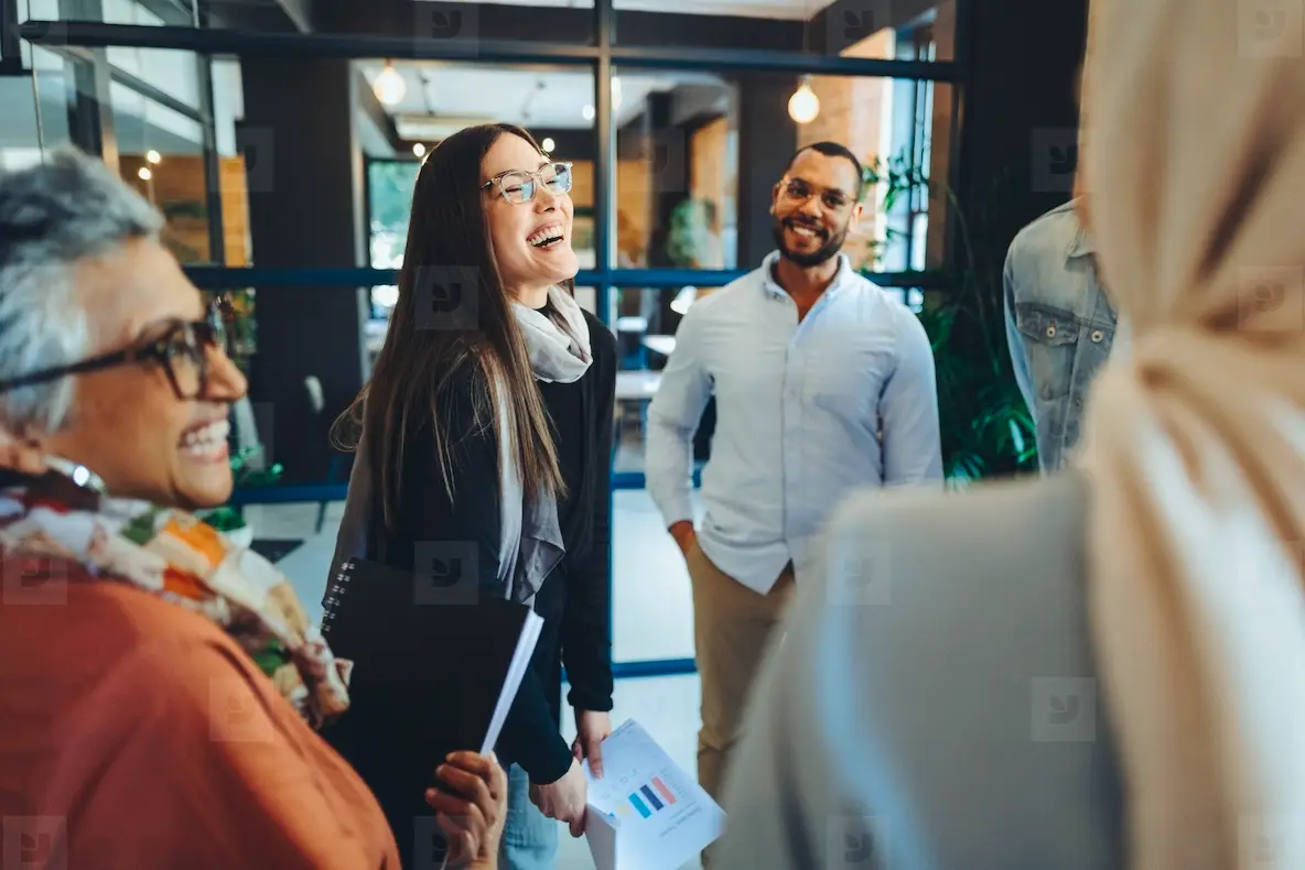 Happy Businesspeople Laughing Cheerfully During A Meeting Photo (270590 ...