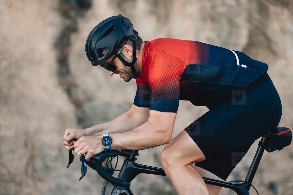 Side View Of A Cyclist Putting Effort During Training Outdoors.Male ...