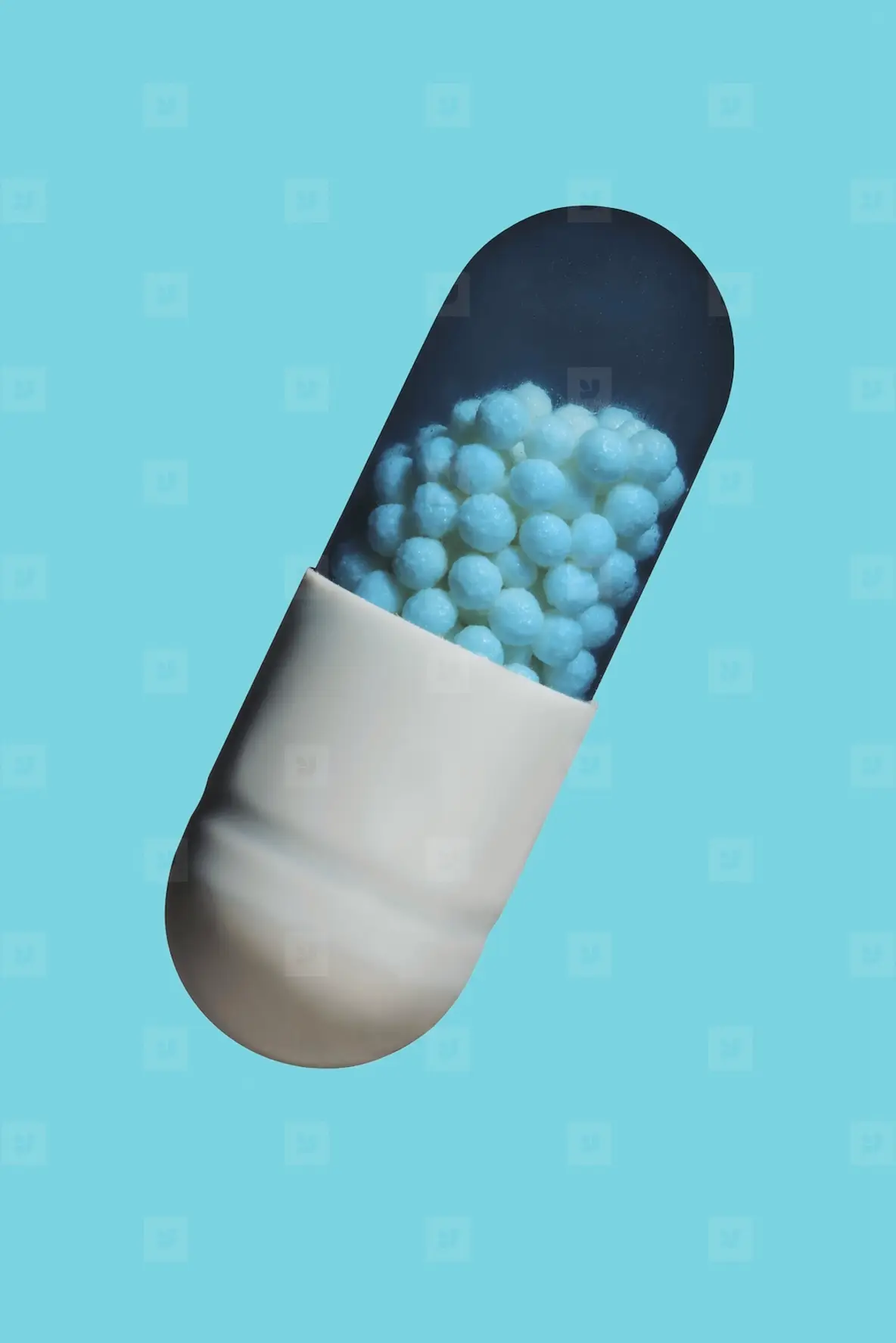 Close Up Granules Inside Medicine Capsule On Blue Background Photo ...