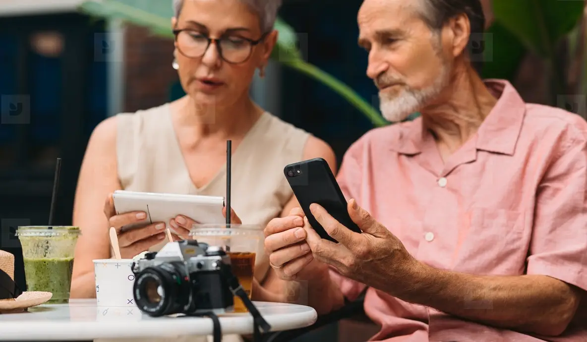 Two Aged People Holding Their Smartphones And Talking Photo (276543 ...