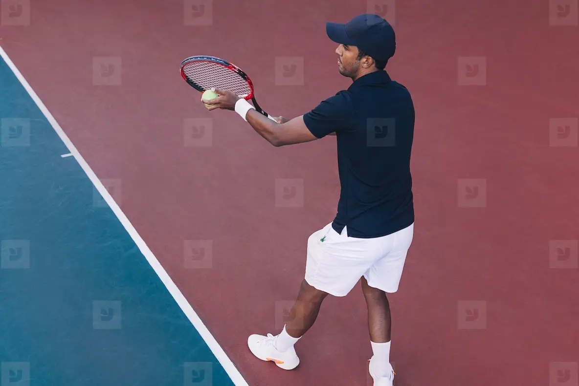 Young Male Tennis Player Ready To Serve Photo (279704) - YouWorkForThem