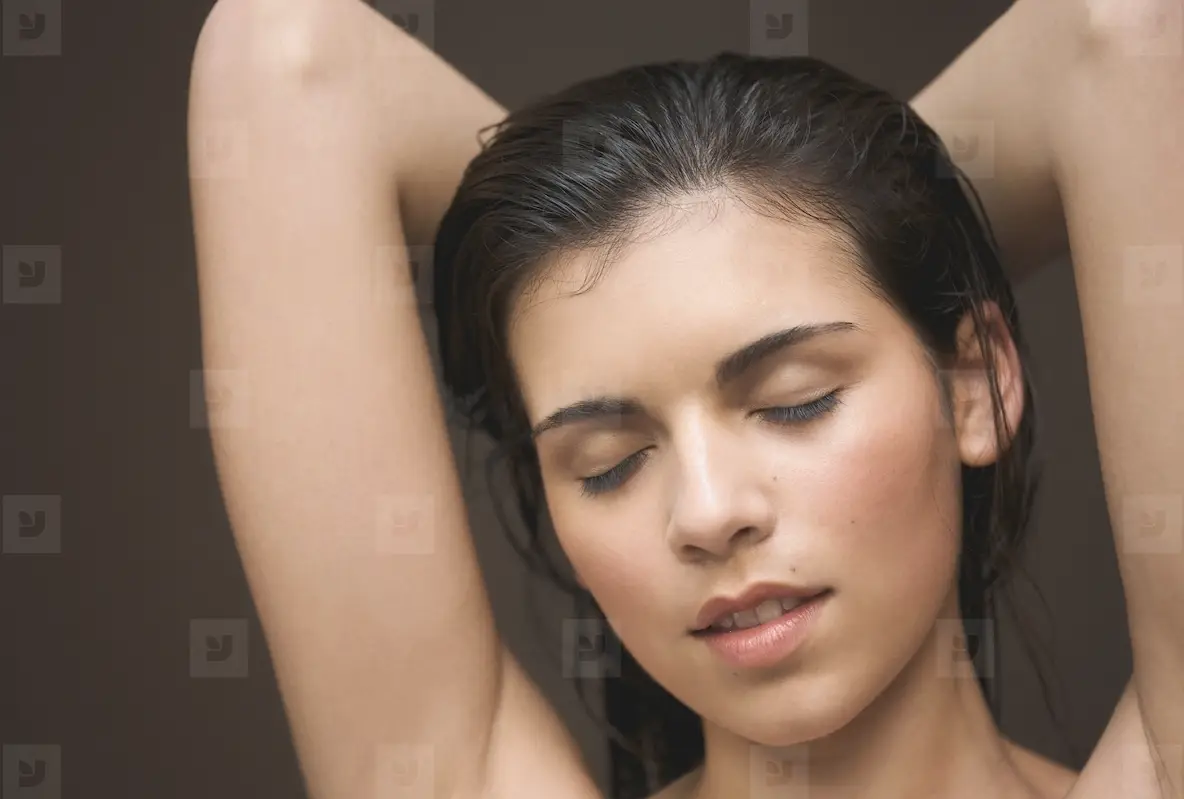 Woman With Her Arms Crossed Behind Her Head Photo (282391) - YouWorkForThem
