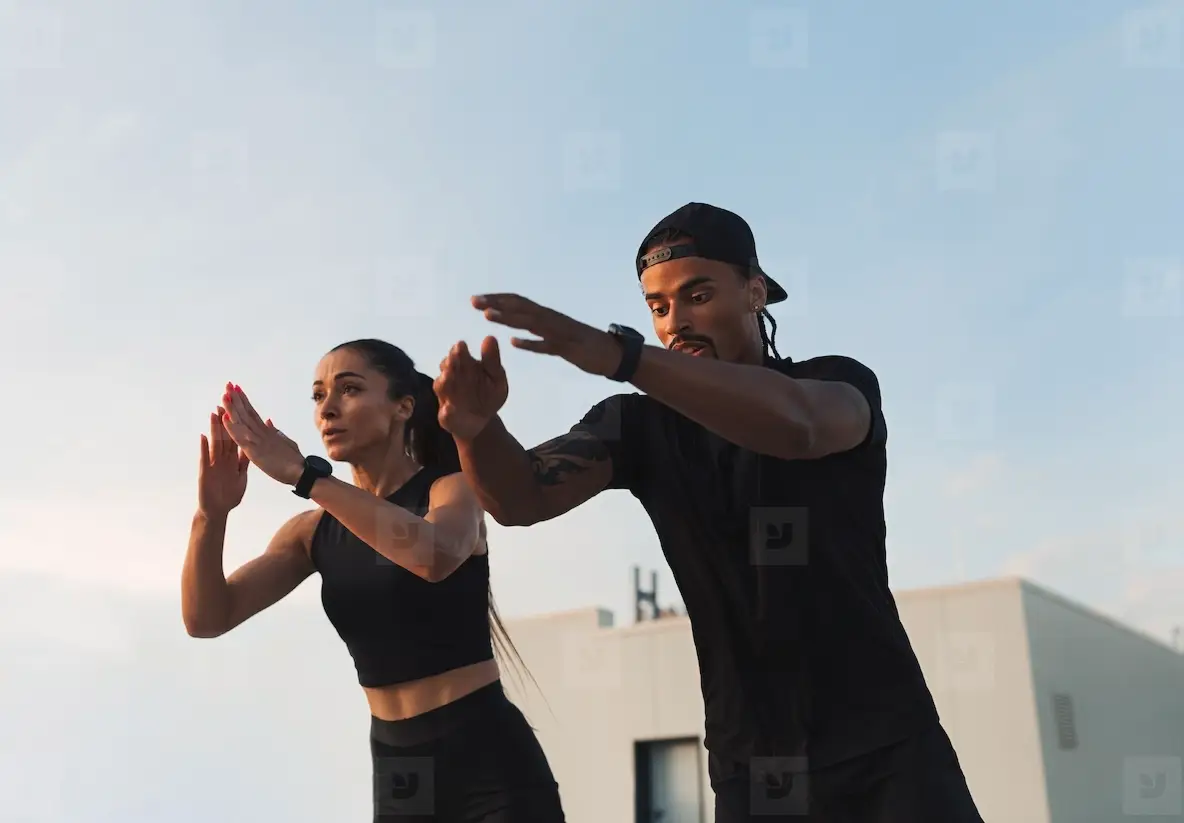 Two Athletes Jumping Together Outdoors On The Roof Photo (283119 ...