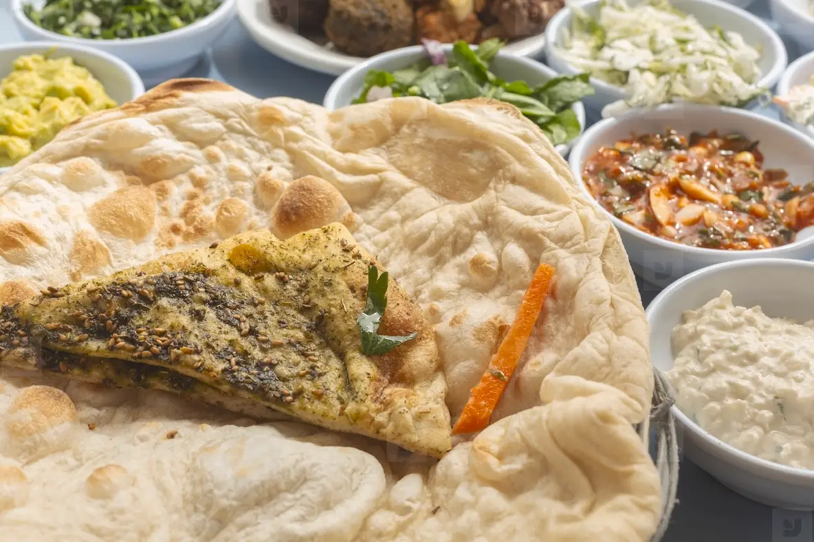 Still Life Flatbread With Zaatar And Israeli Meze Appetizers Photo ...