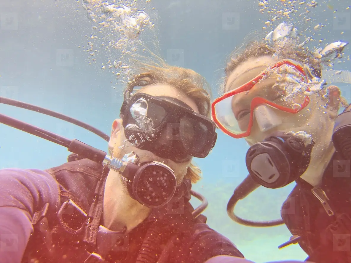 Portrait Happy Couple Scuba Diving Underwater In Sea Photo (304594 ...