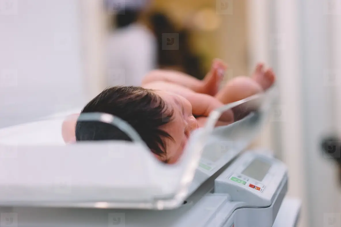 Baby On Hospital Scale Photo (57494) - YouWorkForThem